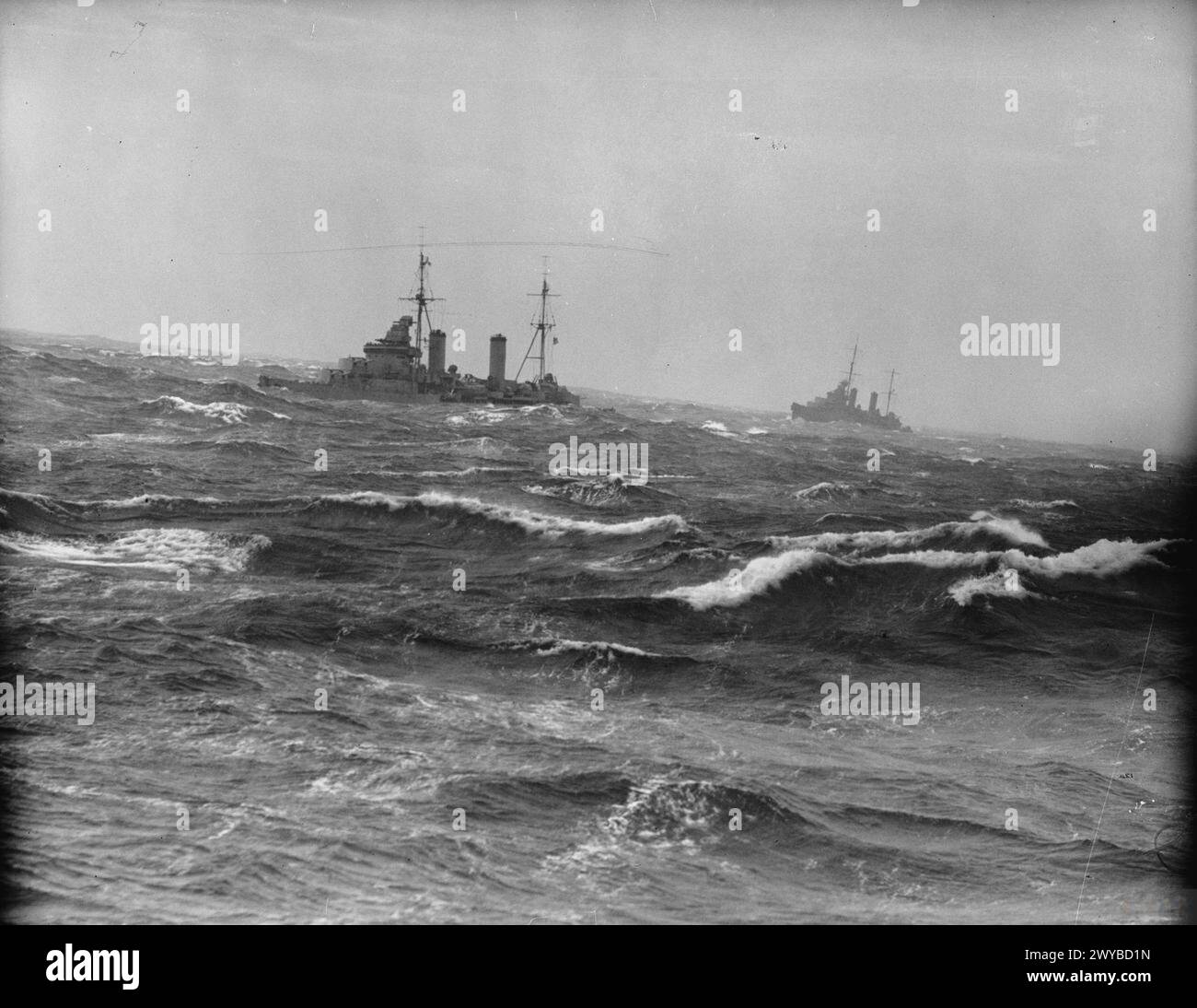 Two cruisers are patrolling the high seas in 1941 to prevent enemy ...