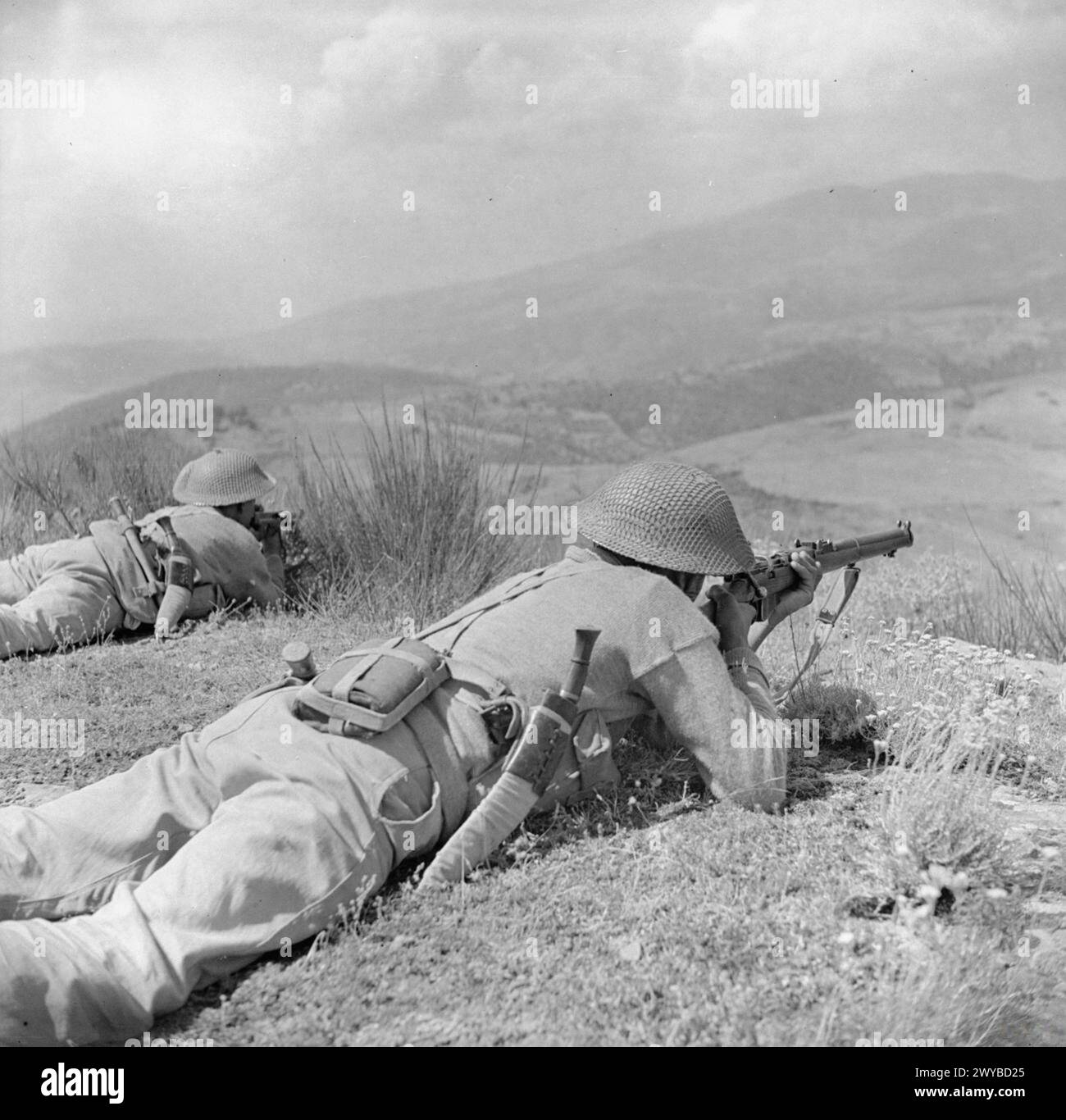 Gurkha soldiers of the 4th Indian Division observe enemy positions from ...