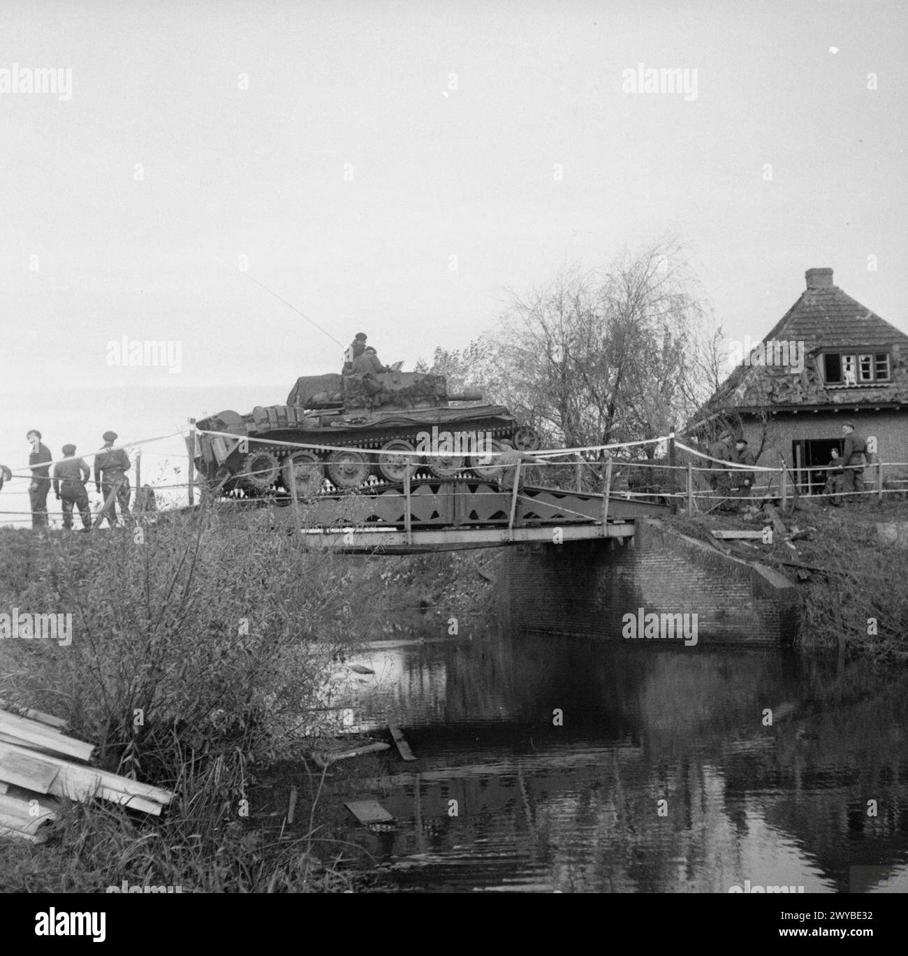 CROMWELL TANKS IN NW EUROPE 1944-45 - Original wartime caption: Cromwell tanks cross the scissor ...
