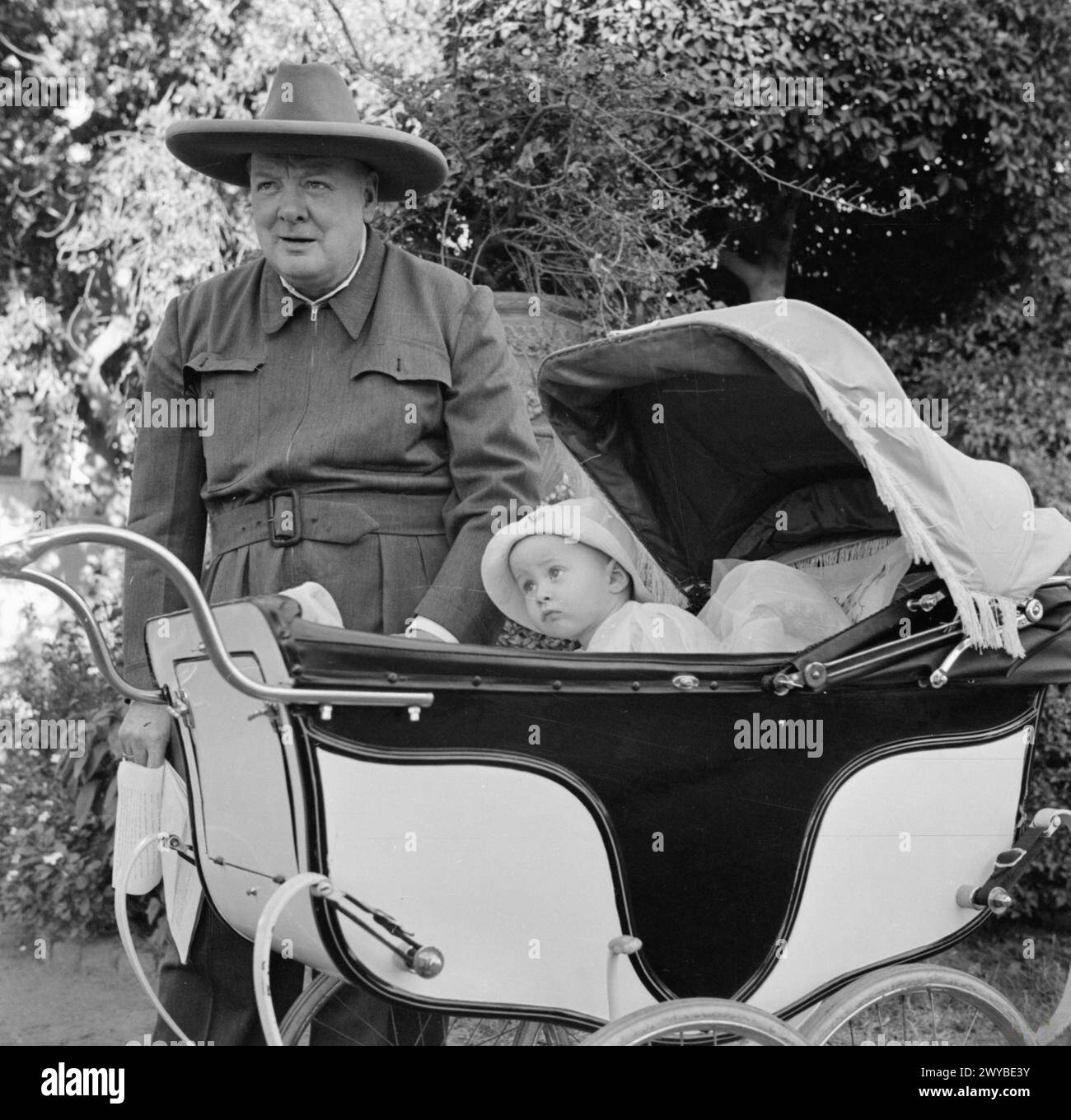 Prime Minister Winston Churchill, wearing a siren suit, is photographed ...