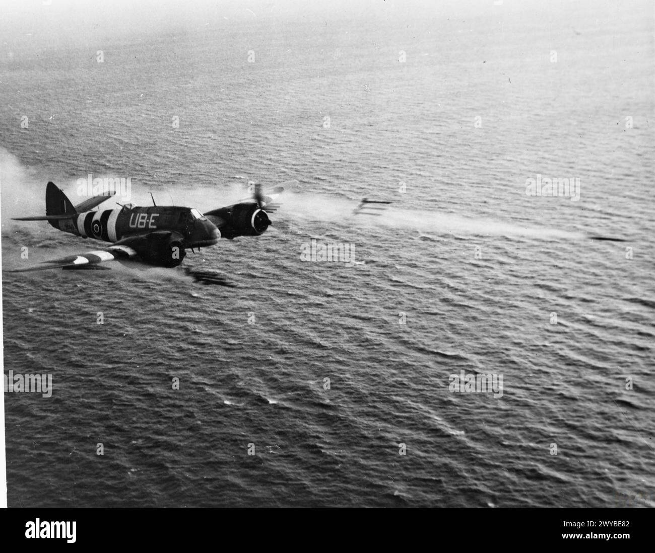 A Bristol Beaufighter TF Mark X of No. 455 Squadron RAAF fires a salvo ...