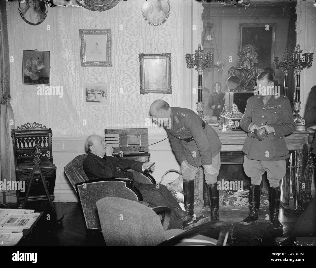 Winston Churchill, First Lord of the Admiralty, speaks with Field ...