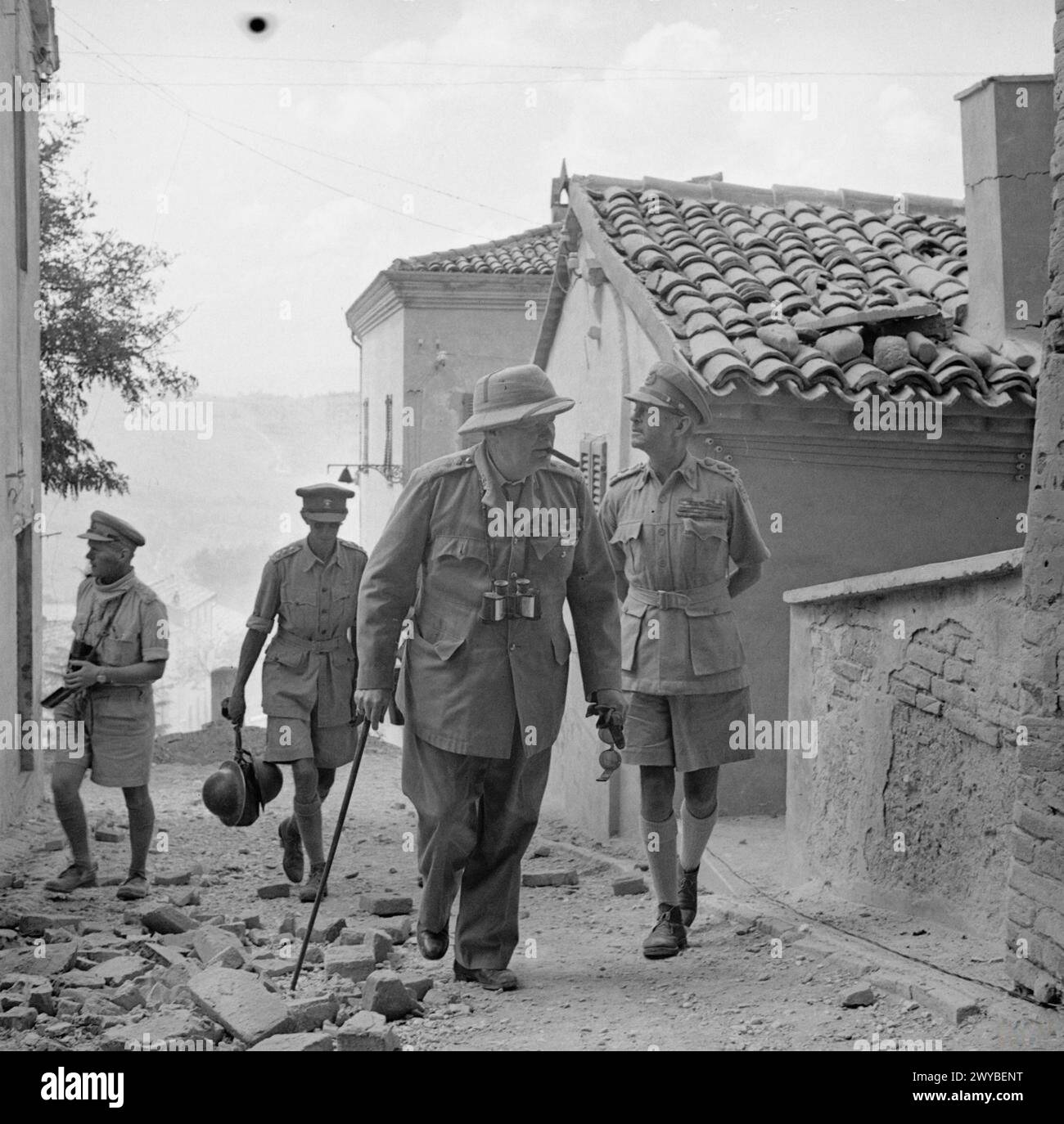 Winston Churchill and General Harold Alexander walk to an observation ...