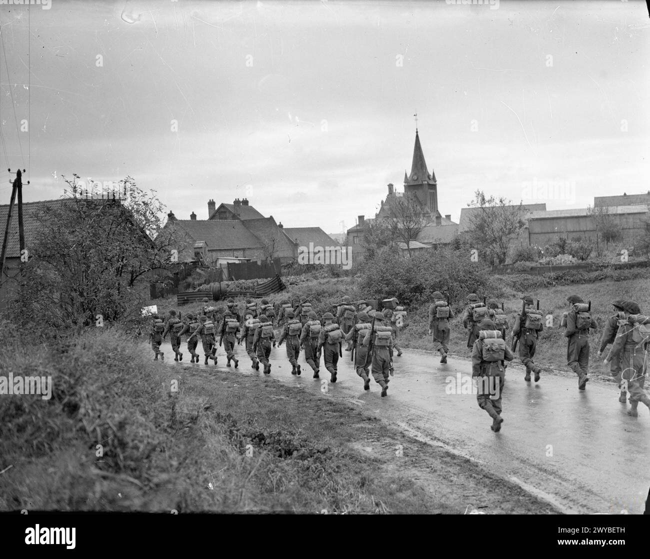 Soldiers of the Royal Irish Fusiliers march near Gavrelle, close to ...