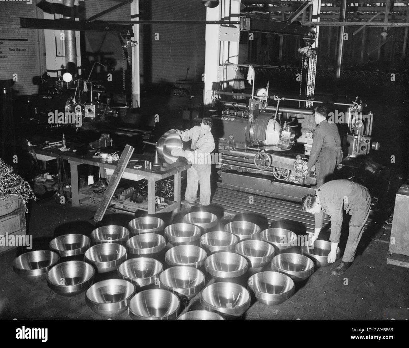 TORPEDO PRODUCTION ON BRITAIN'S HOME FRONT, 1940 - Workers machine and ...