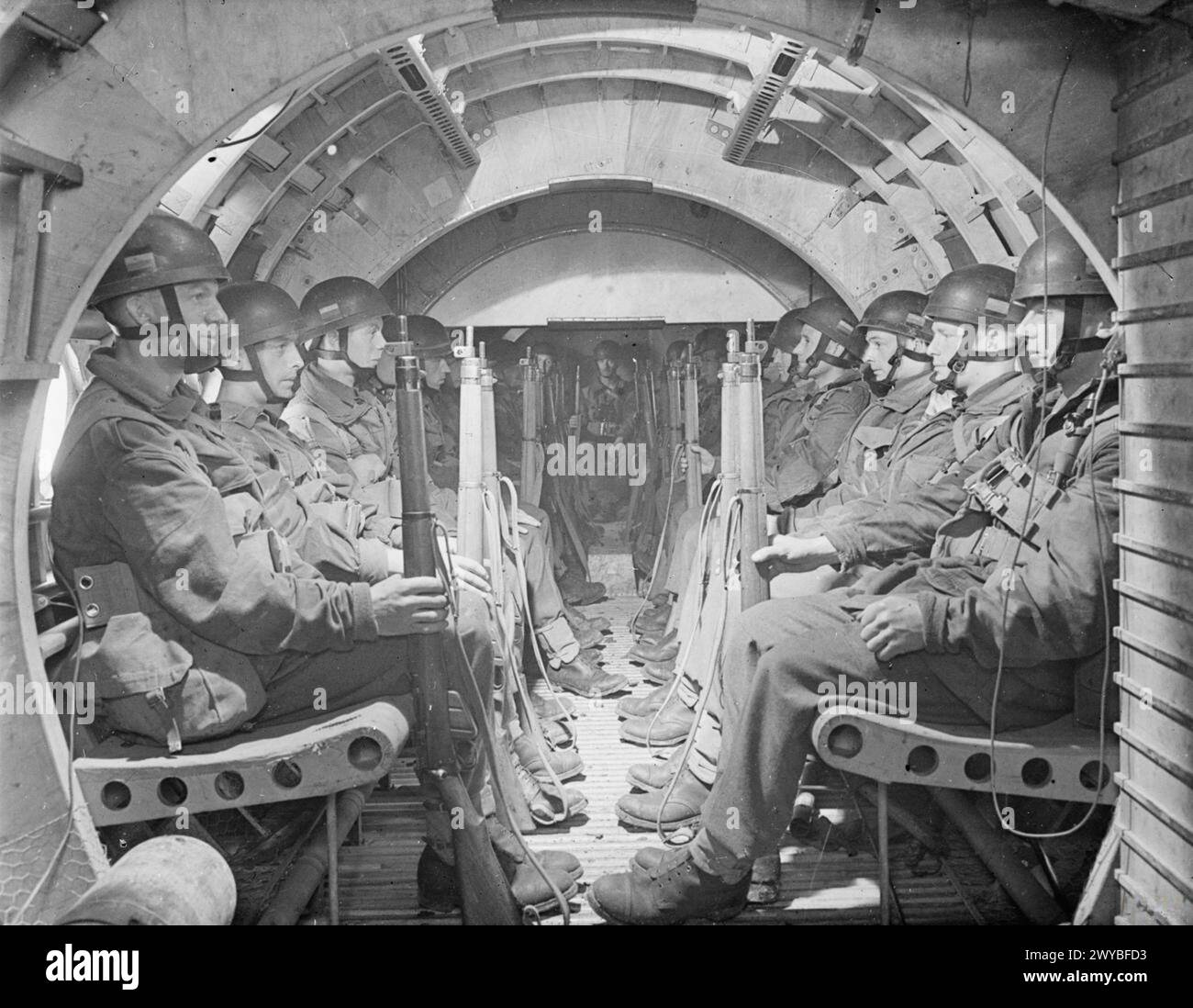 Airborne troops sit inside an Airspeed Horsa glider of the Heavy Glider ...