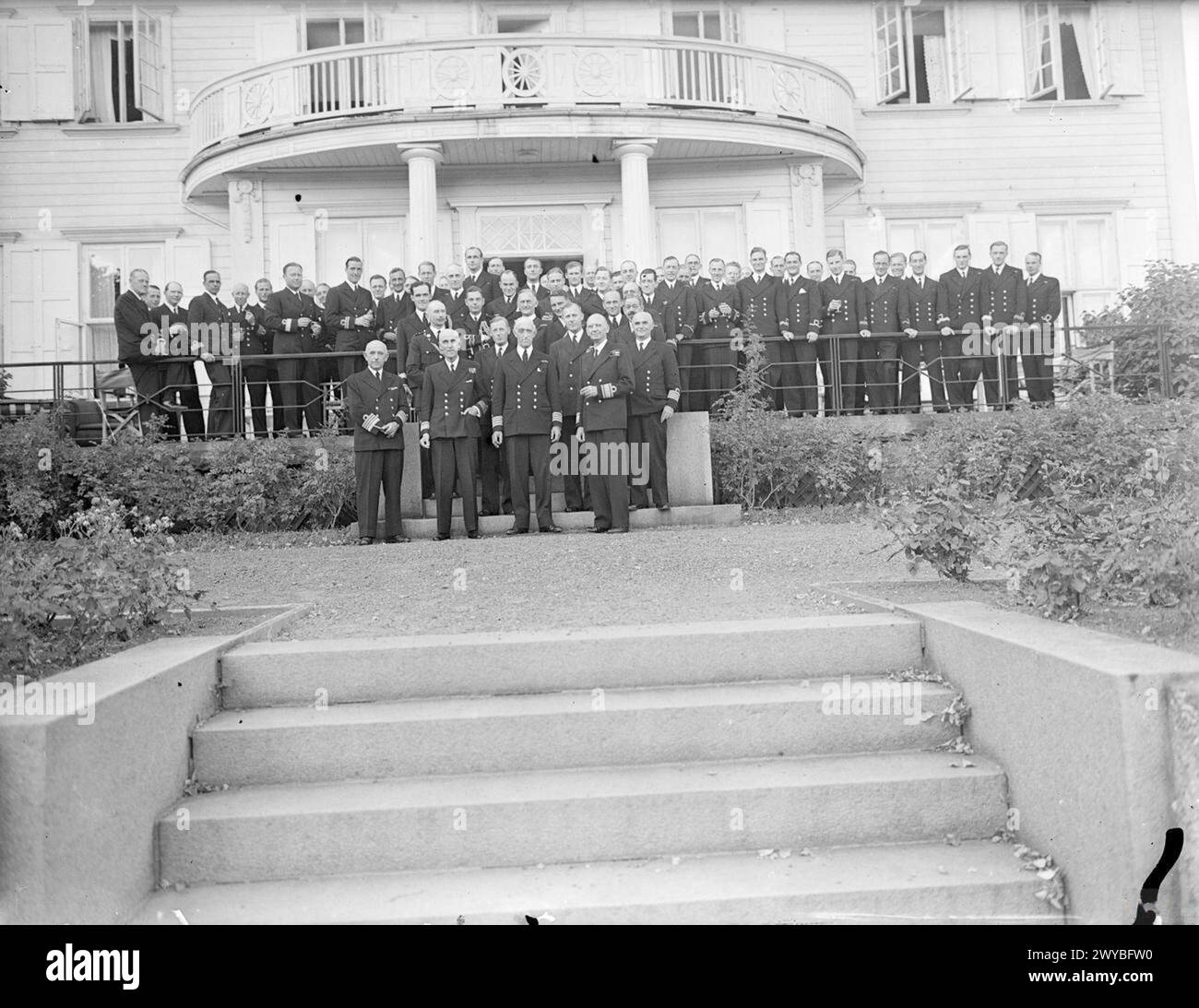 Rear Admiral J S M Ritchie, CB, Flag Officer Norway, with his staff and ...