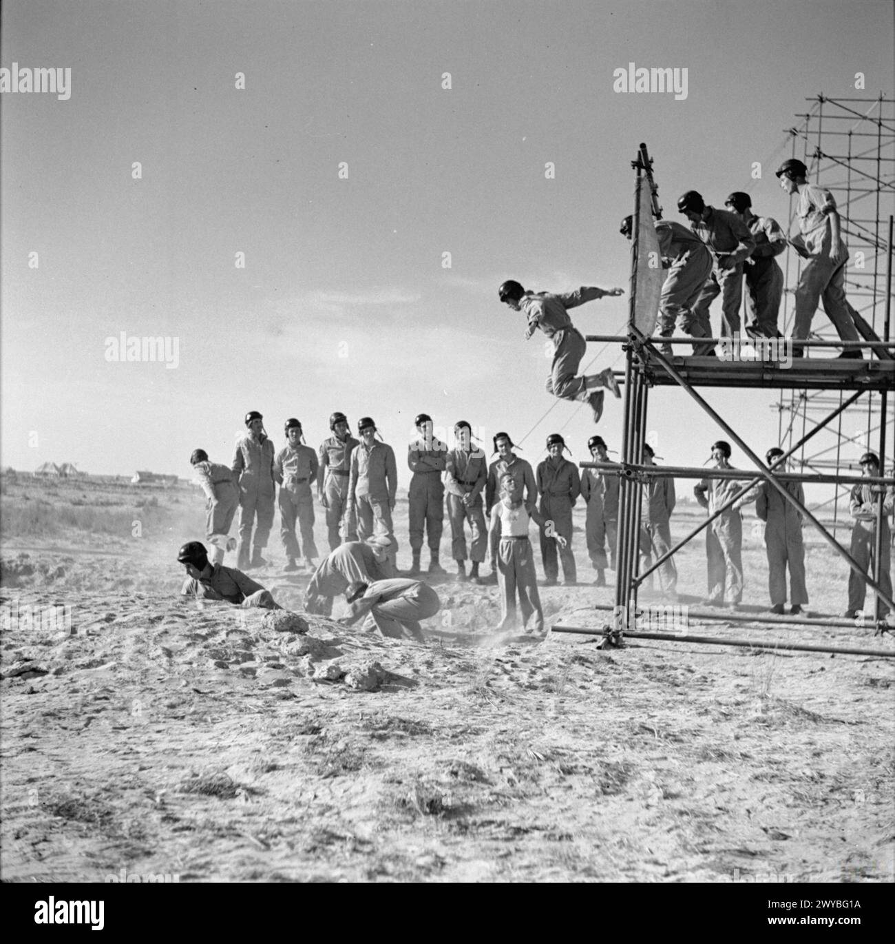 SAS volunteers perform parachute jumps from steel gantries during ...