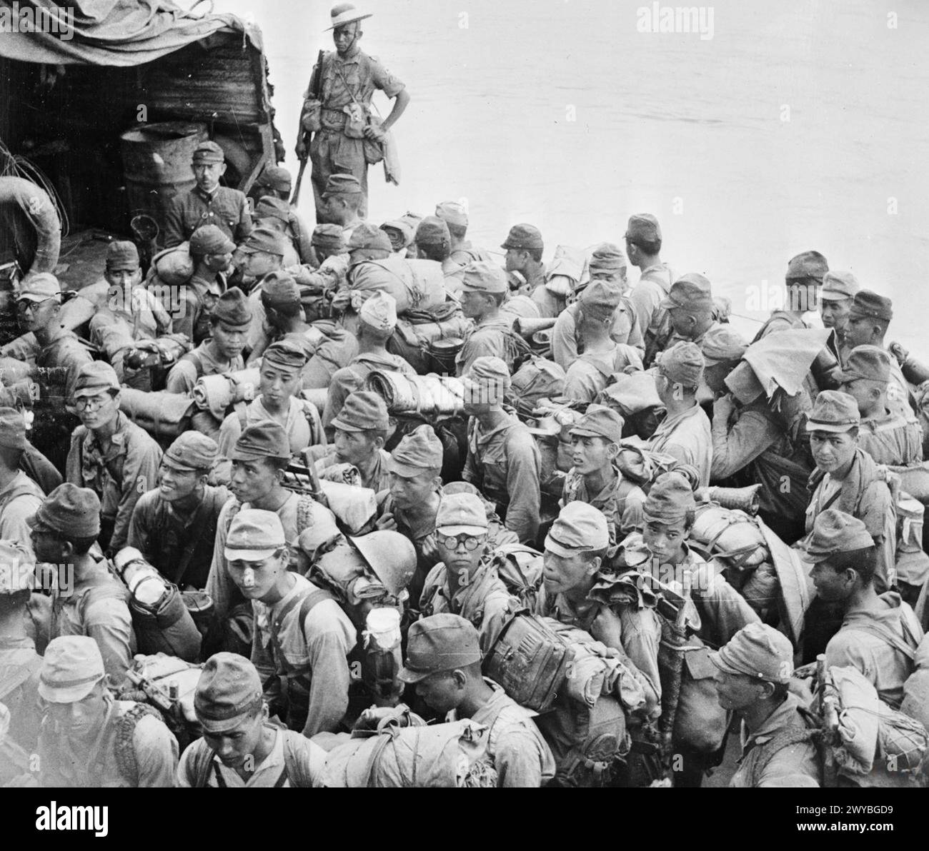 Japanese soldiers of the 53rd Infantry Division surrender on 24 ...