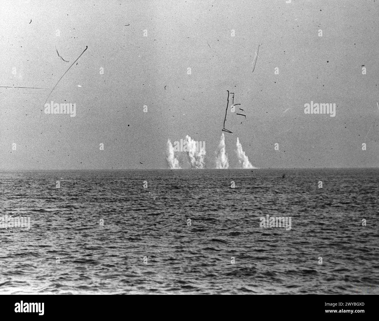 In November 1943, naval personnel detonate mines in a controlled ...