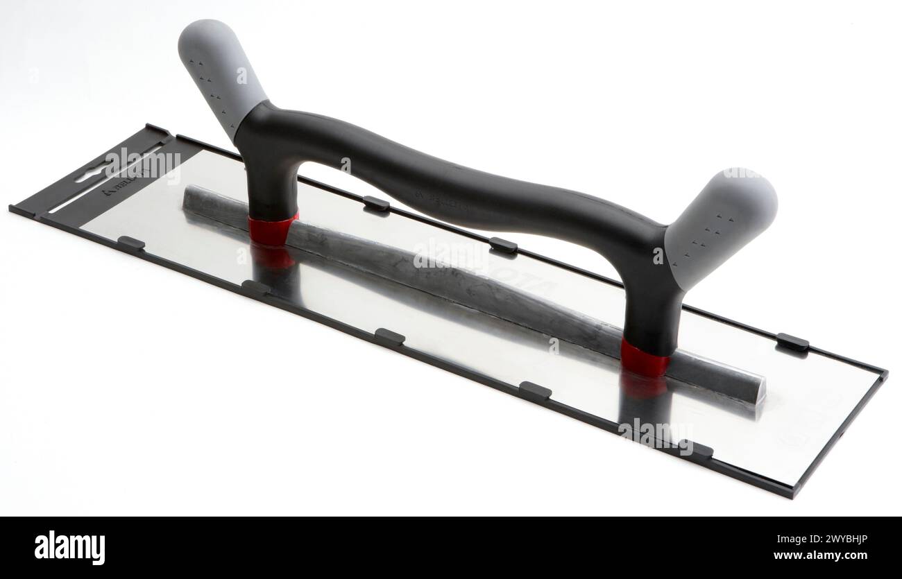 Finishing trowel with bi-material handle Stock Photo - Alamy