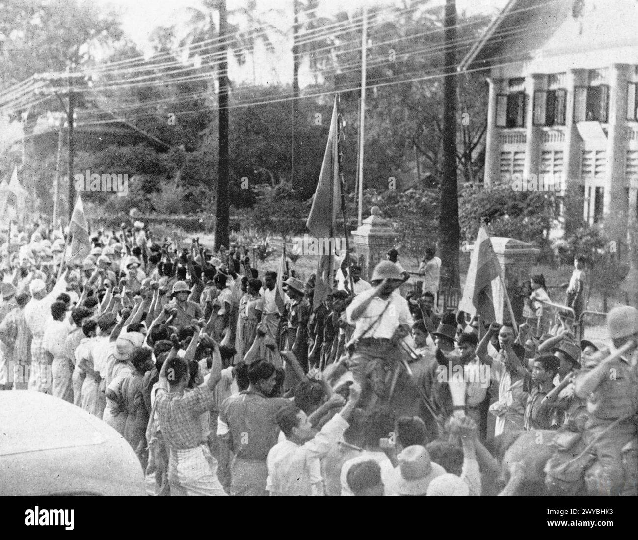 THE BURMA CAMPAIGN, 1942-1945 - Japanese forces enter Tavoy, cheered on by Burmese, 1942 ...