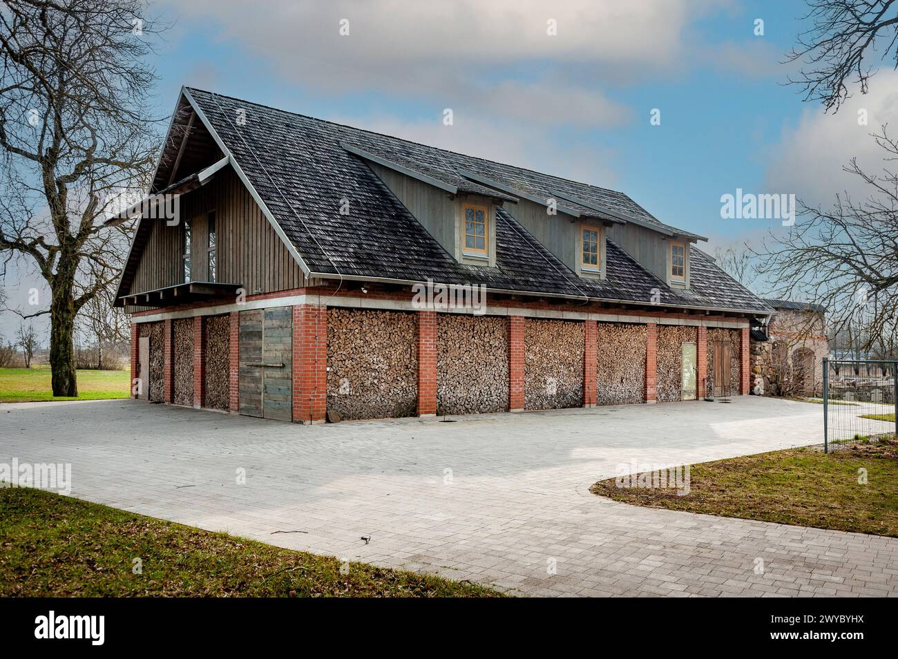 An old barn or shed was used to make a summer house with walls made of ...