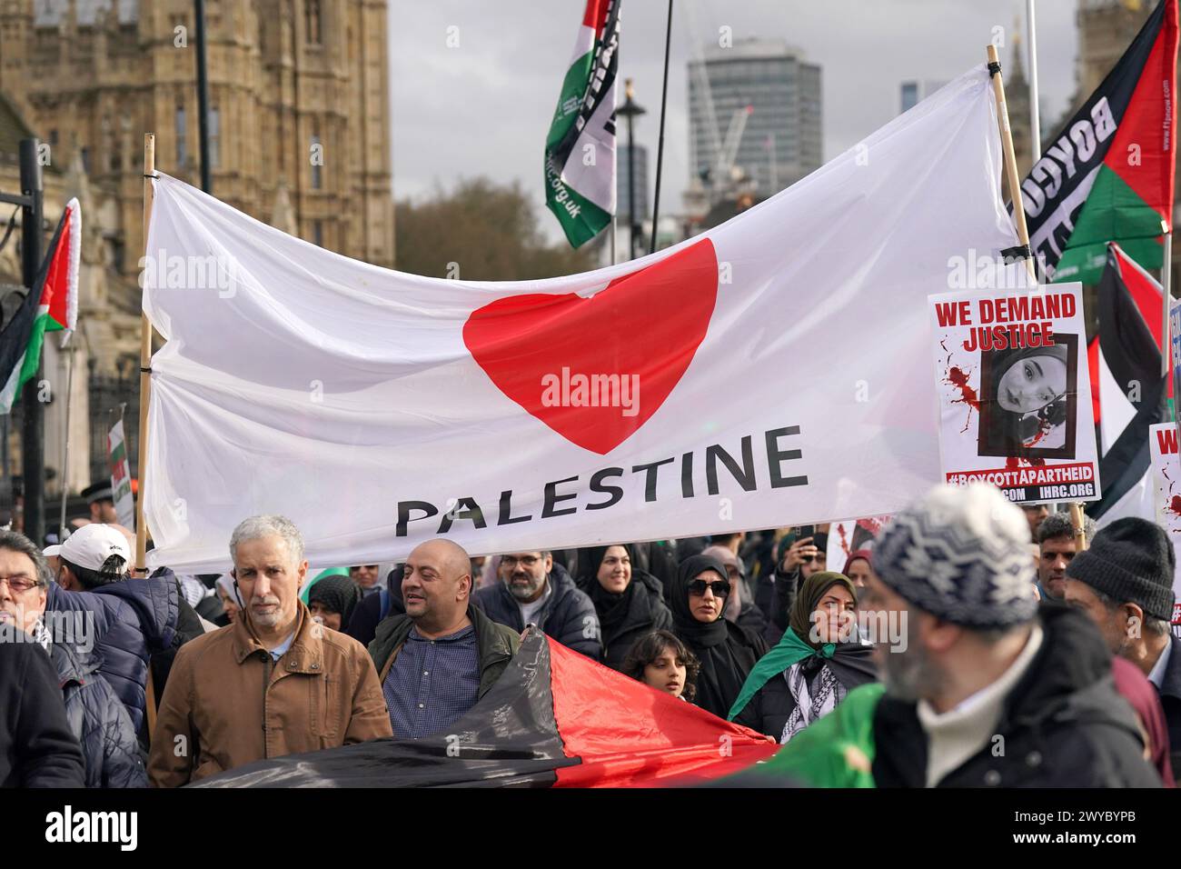 Demonstrators march through London, during an Al-Quds Day rally ...