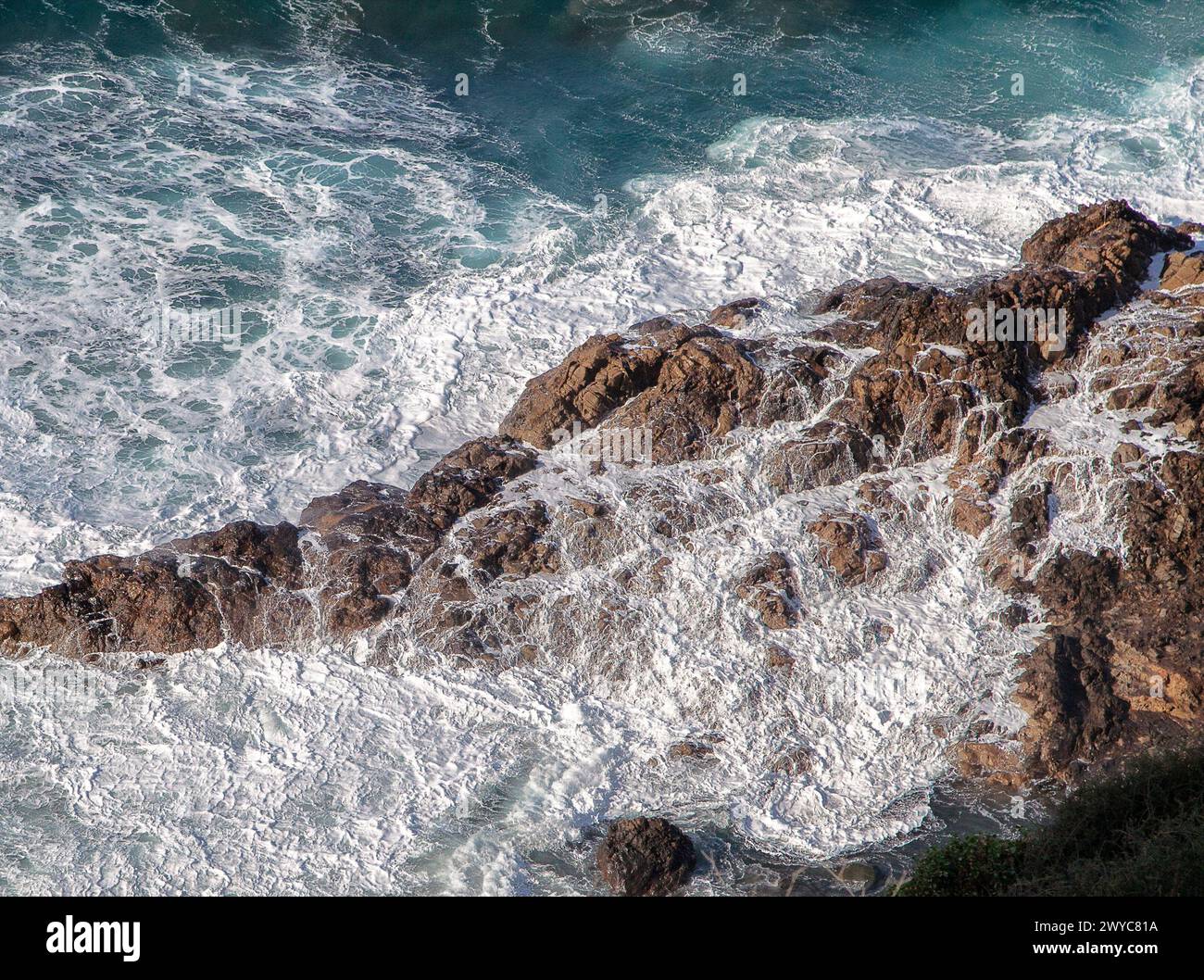 Splashing waves against rocks from hi-res stock photography and images ...