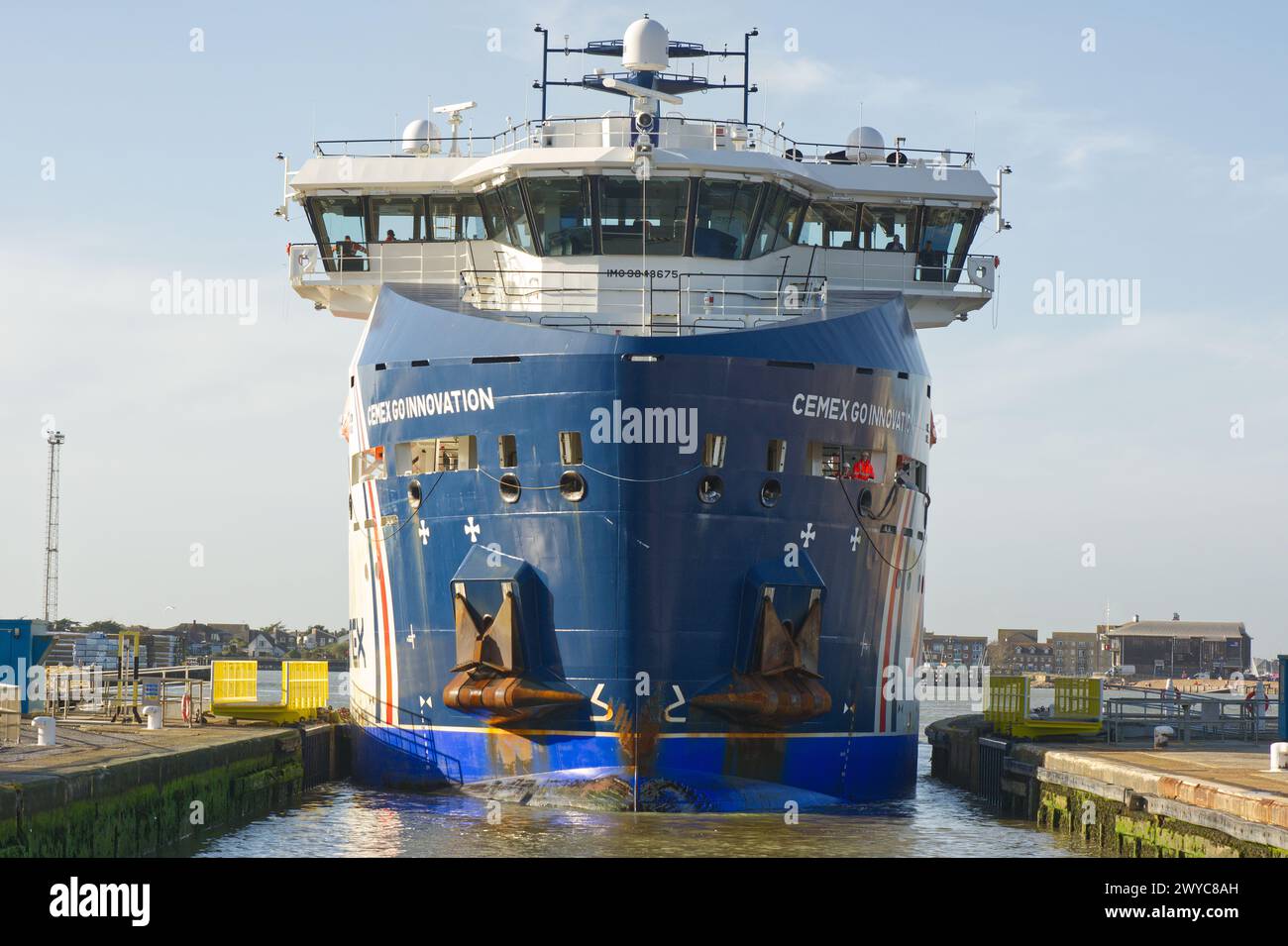 Large ship entering the lock at Shoreham Harbour and Port in West ...