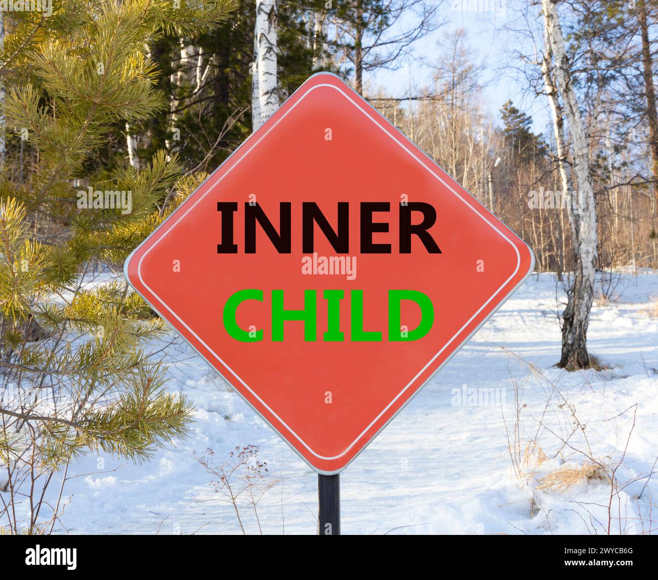 Inner child symbol. Concept words Inner child on beautiful red road ...