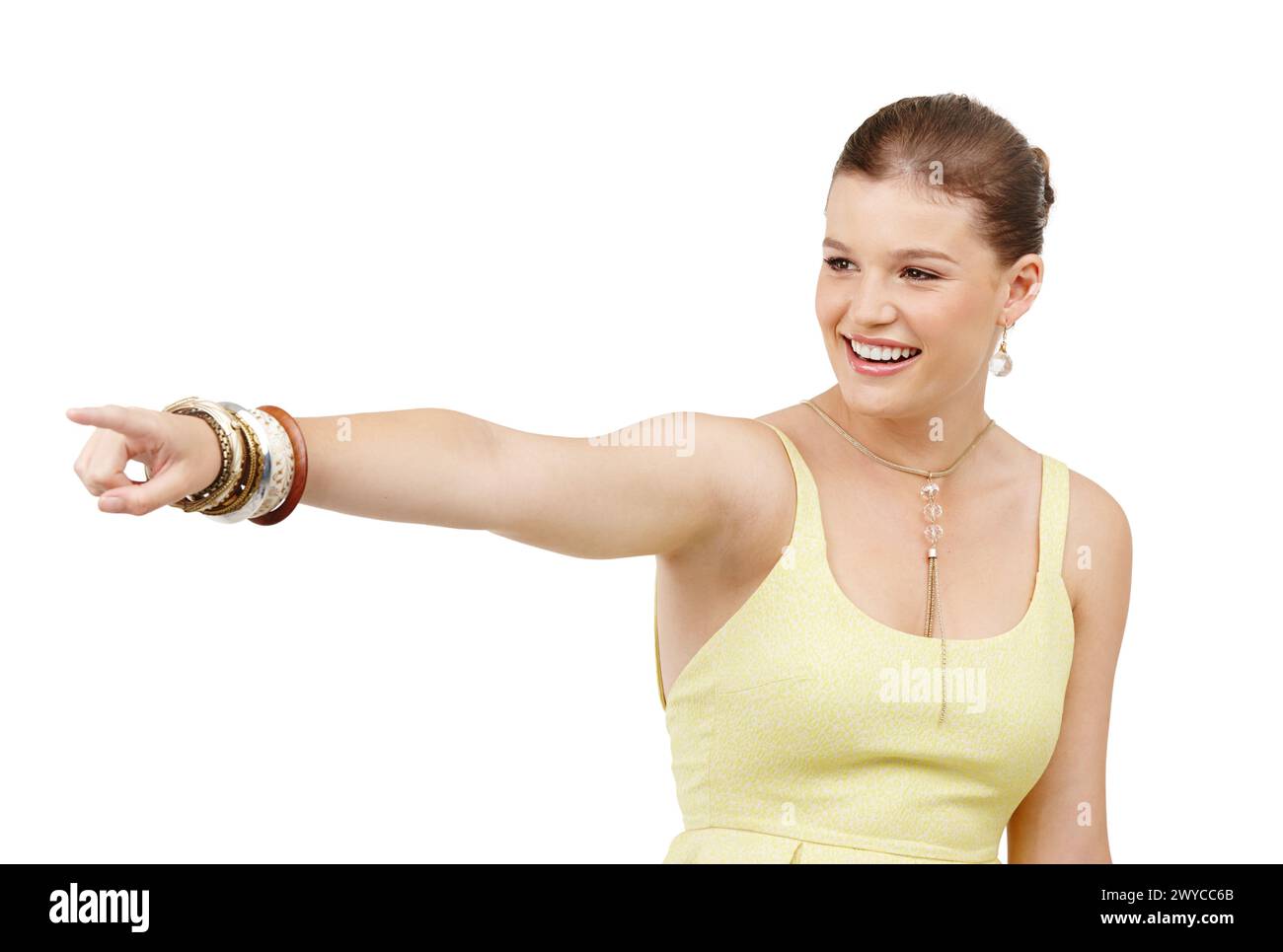 Woman, happy and pointing for choice in studio, option and selection on ...