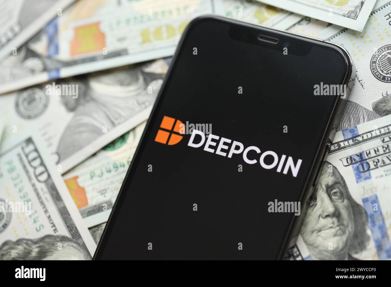KYIV, UKRAINE - MARCH 15, 2024 Deepcoin logo on iPhone display screen ...
