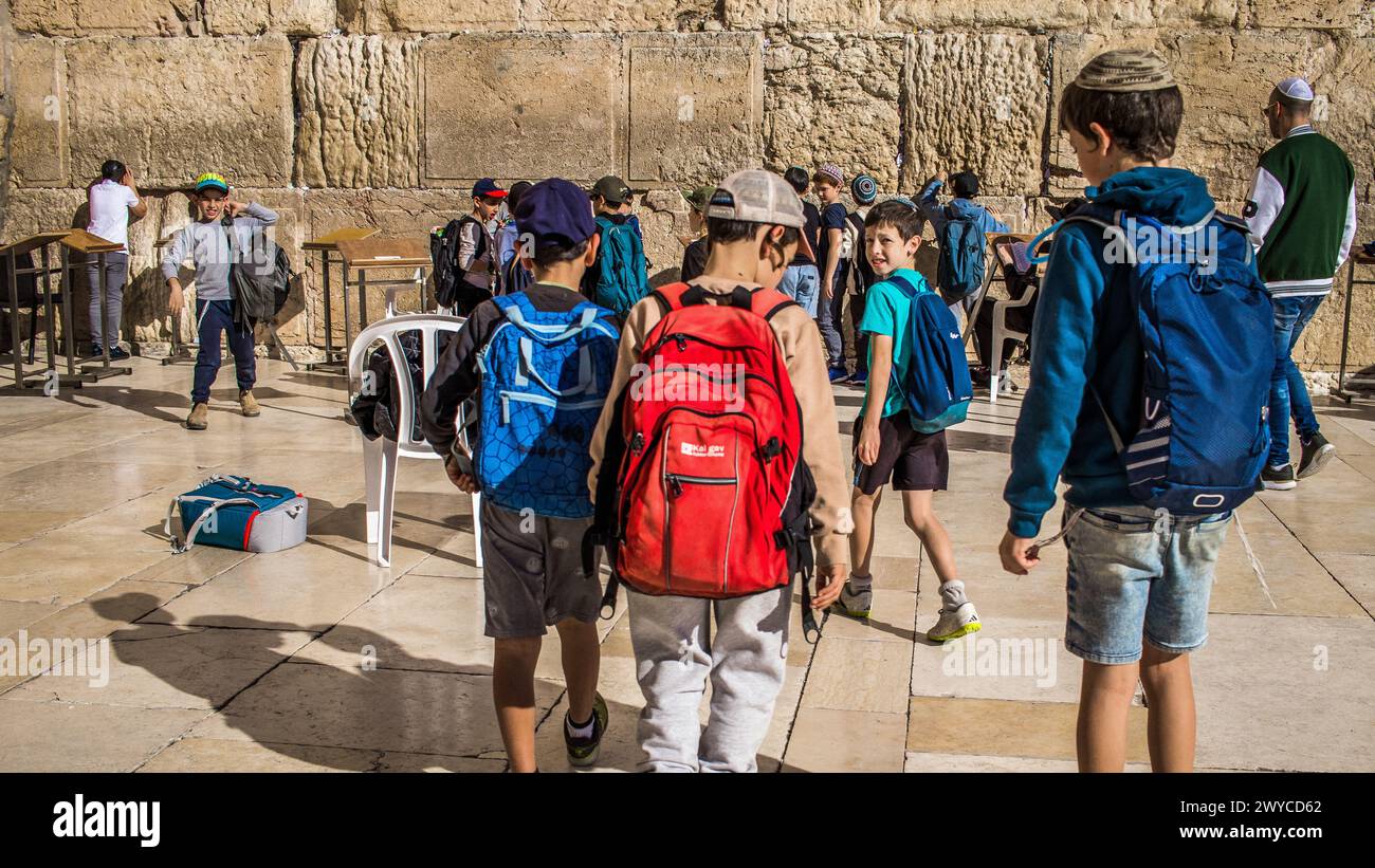 Jerusalem, Israel – December 26, 2023 Young kids come to pray at the ...