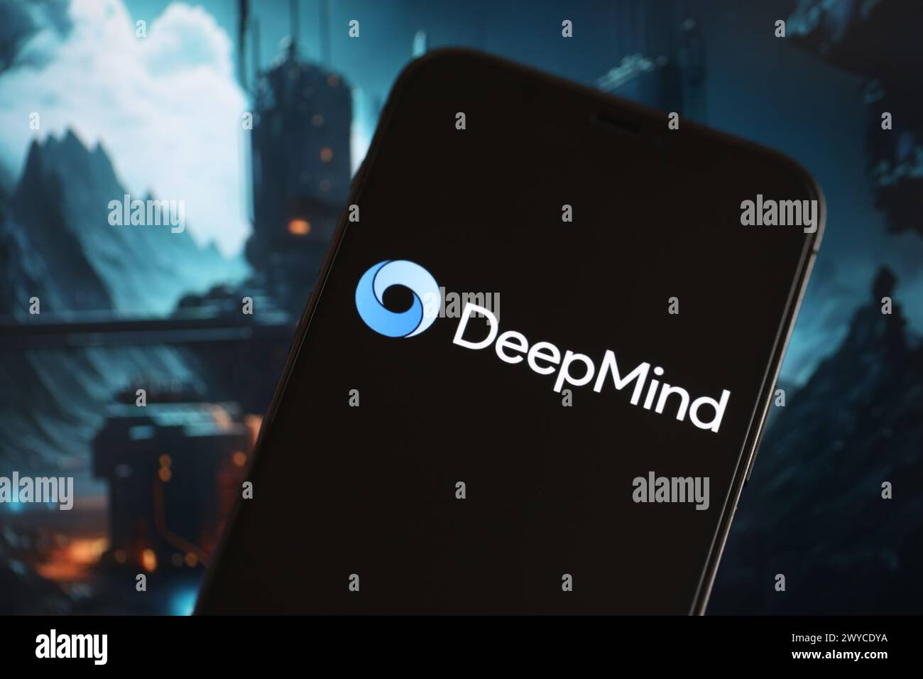 KYIV, UKRAINE - MARCH 17, 2024 DeepMind logo on iPhone display screen with background of ...