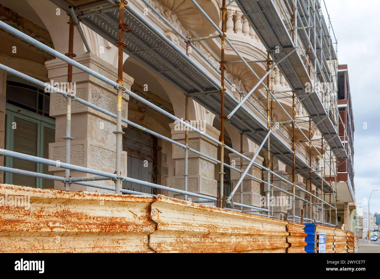 Fence and scaffolding in building in revitalization in Havana, Cuba ...