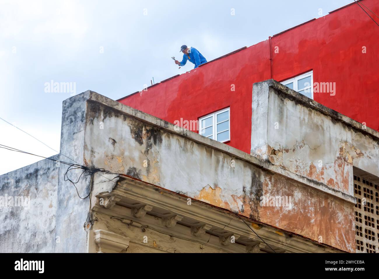 Man repairing wall hi-res stock photography and images - Alamy