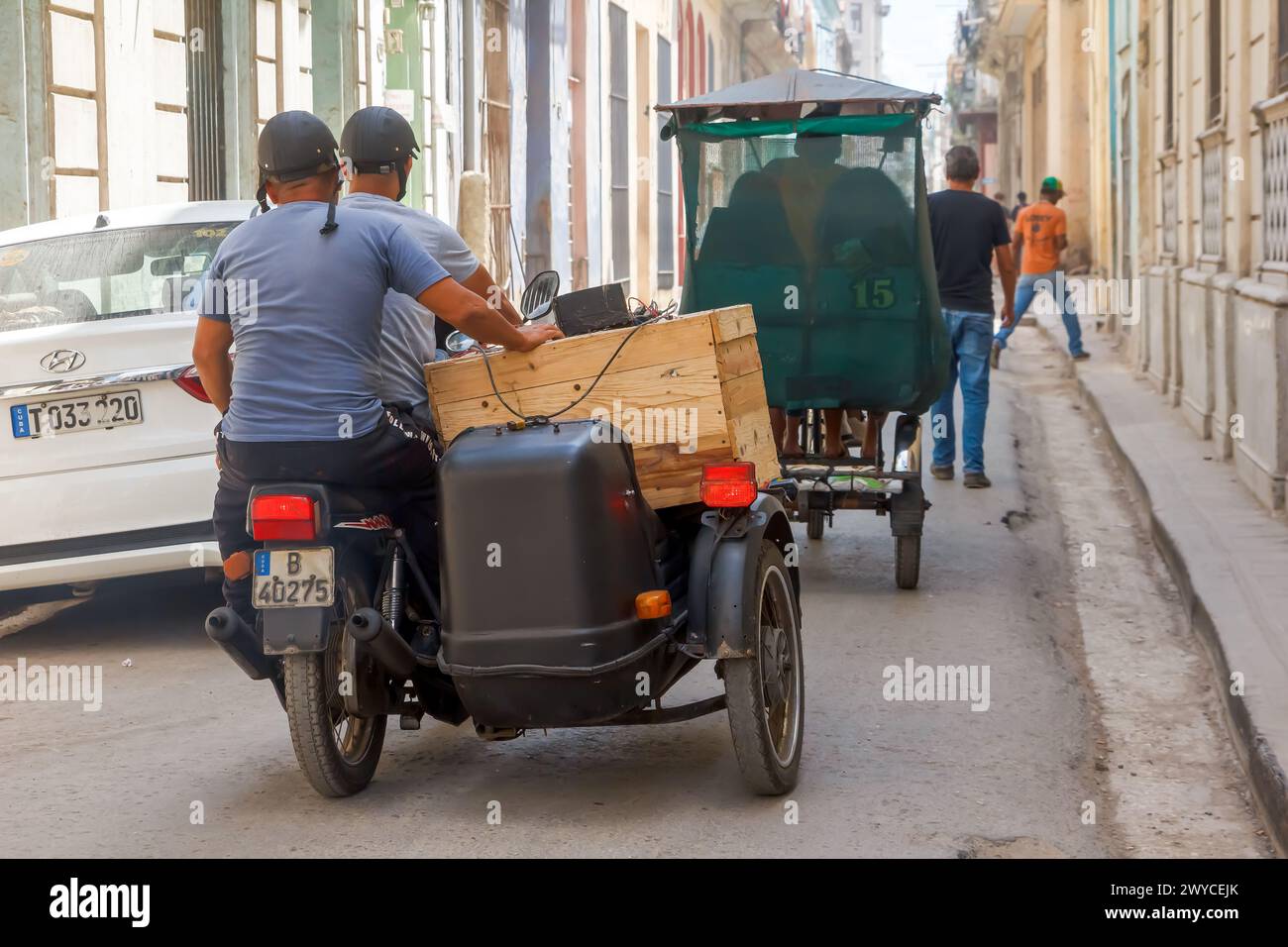 Cuban people on sidecar with a box in Havana, Cuba Stock Photo - Alamy