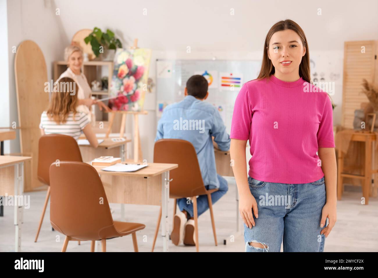 Female student during art lecture at school Stock Photo - Alamy