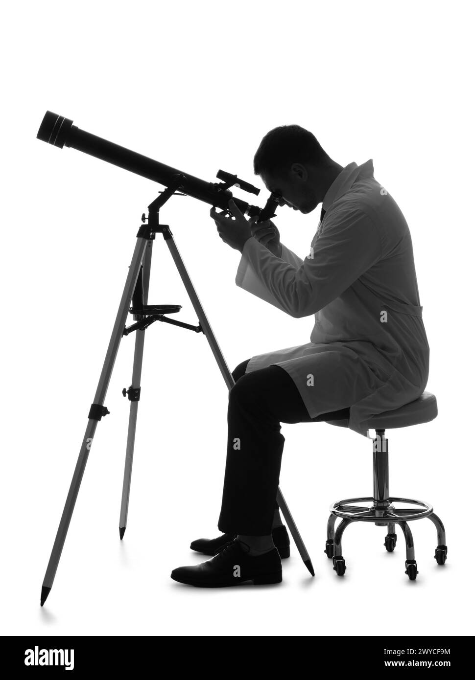 Silhouette of male scientist using telescope on white background Stock ...
