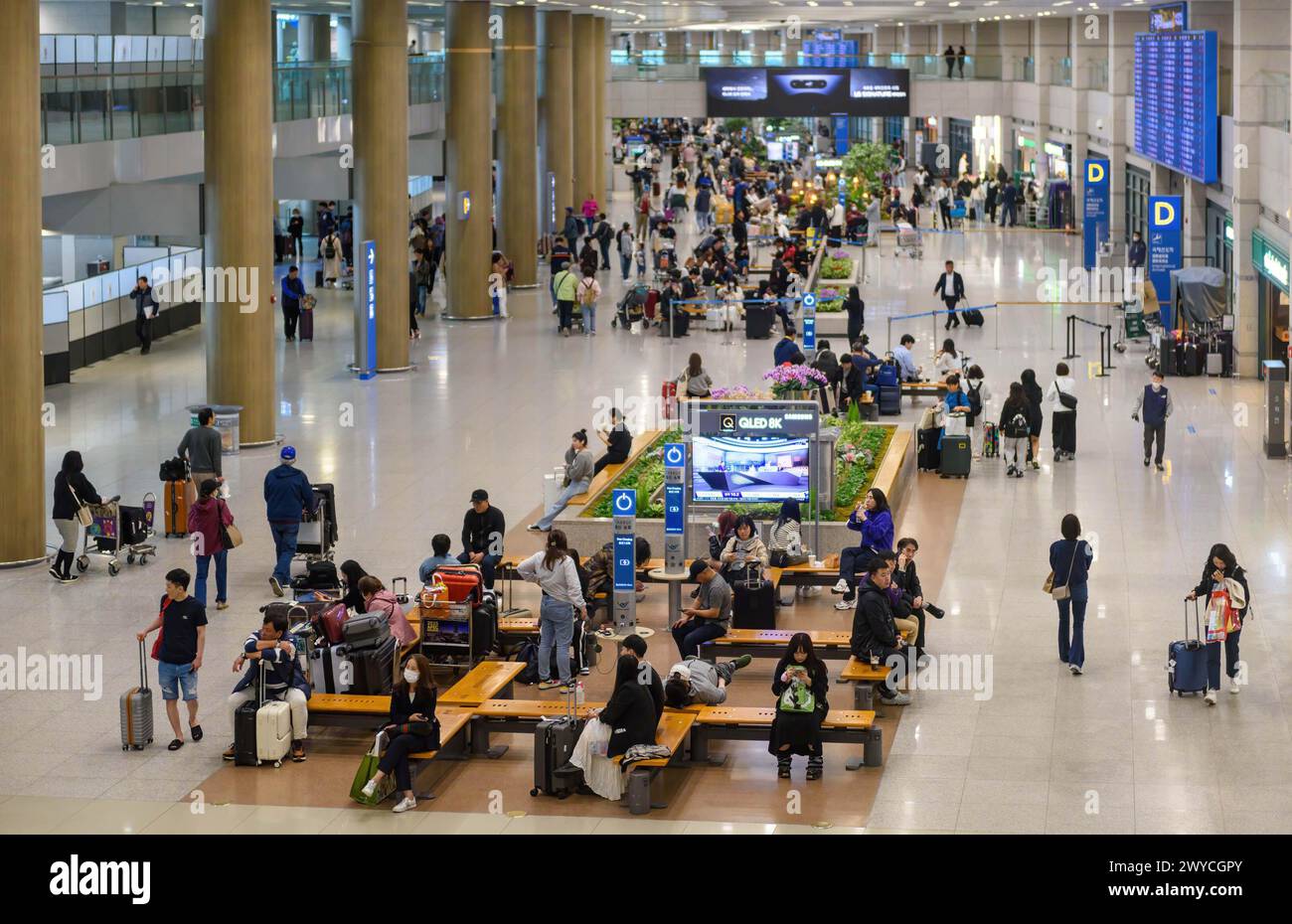travelers seen at the Incheon International Airport Stock Photo - Alamy