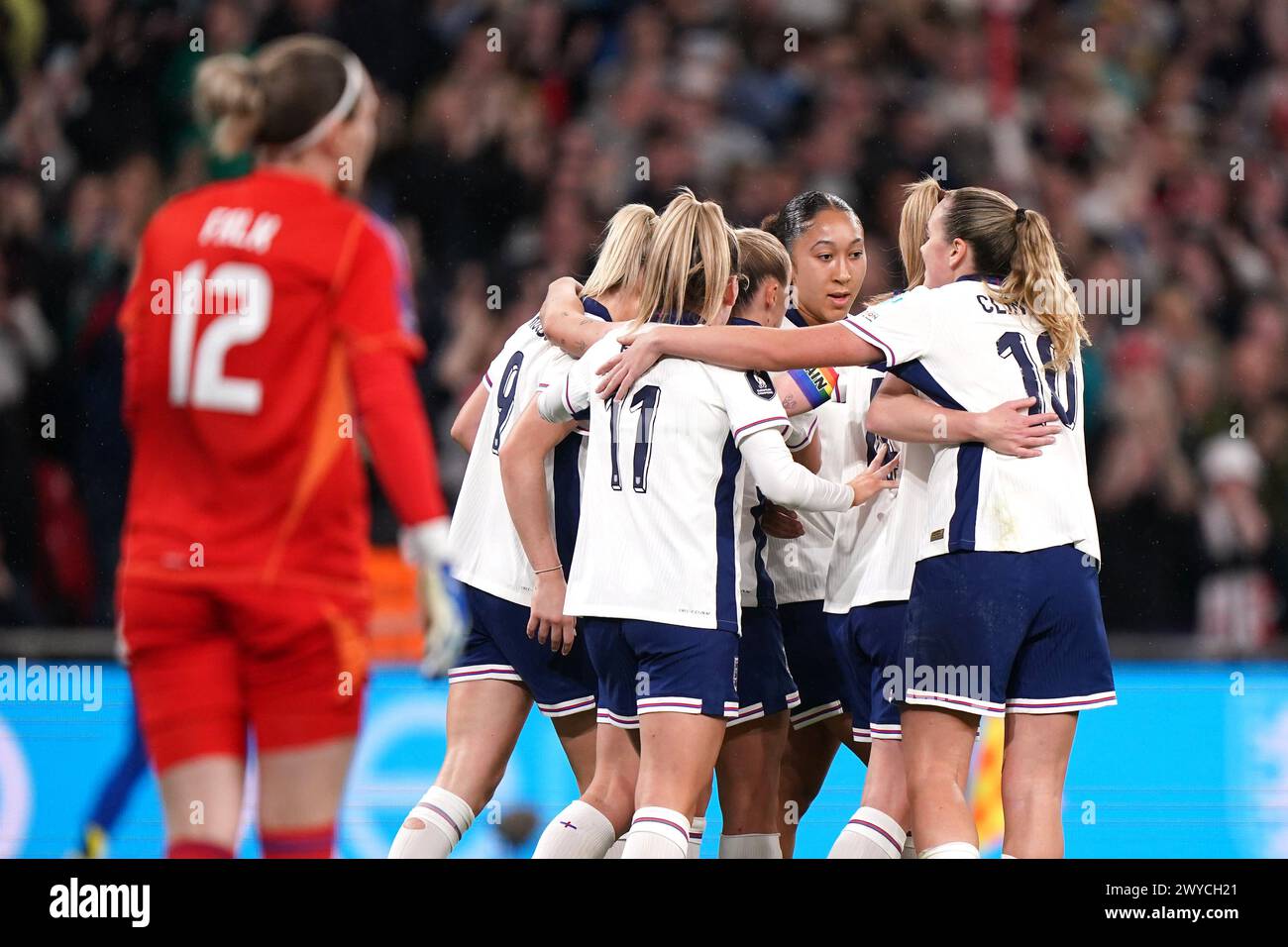 England's Alessia Russo (hidden) celebrates scoring their side's first ...