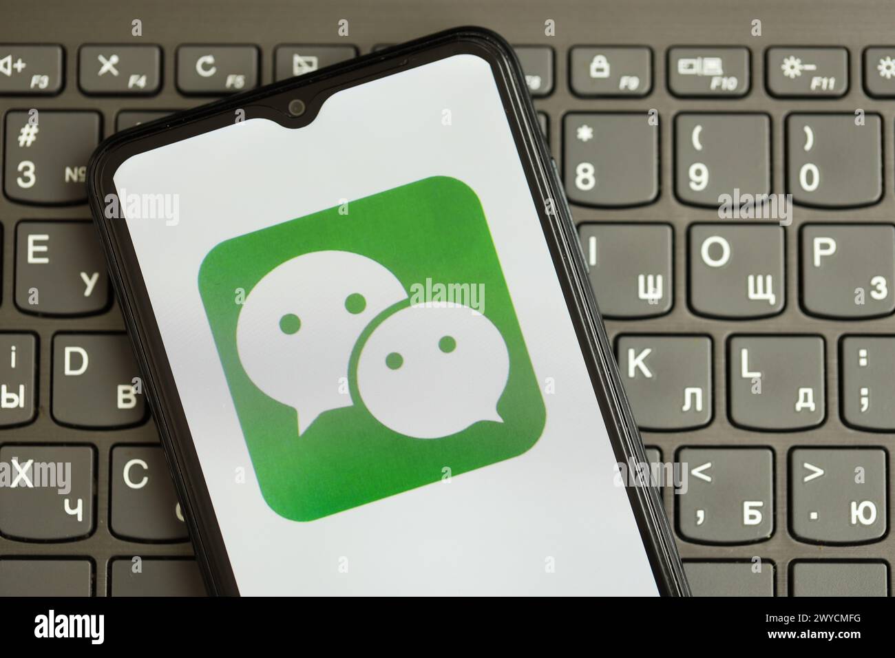 KYIV, UKRAINE - APRIL 1, 2024 Wechat or Weixin icon on smartphone ...
