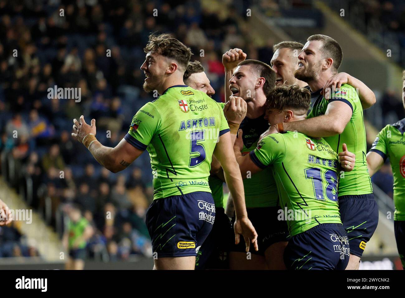 Warrington Wolves Danny Walker (hidden) celebrates scoring his side's ...