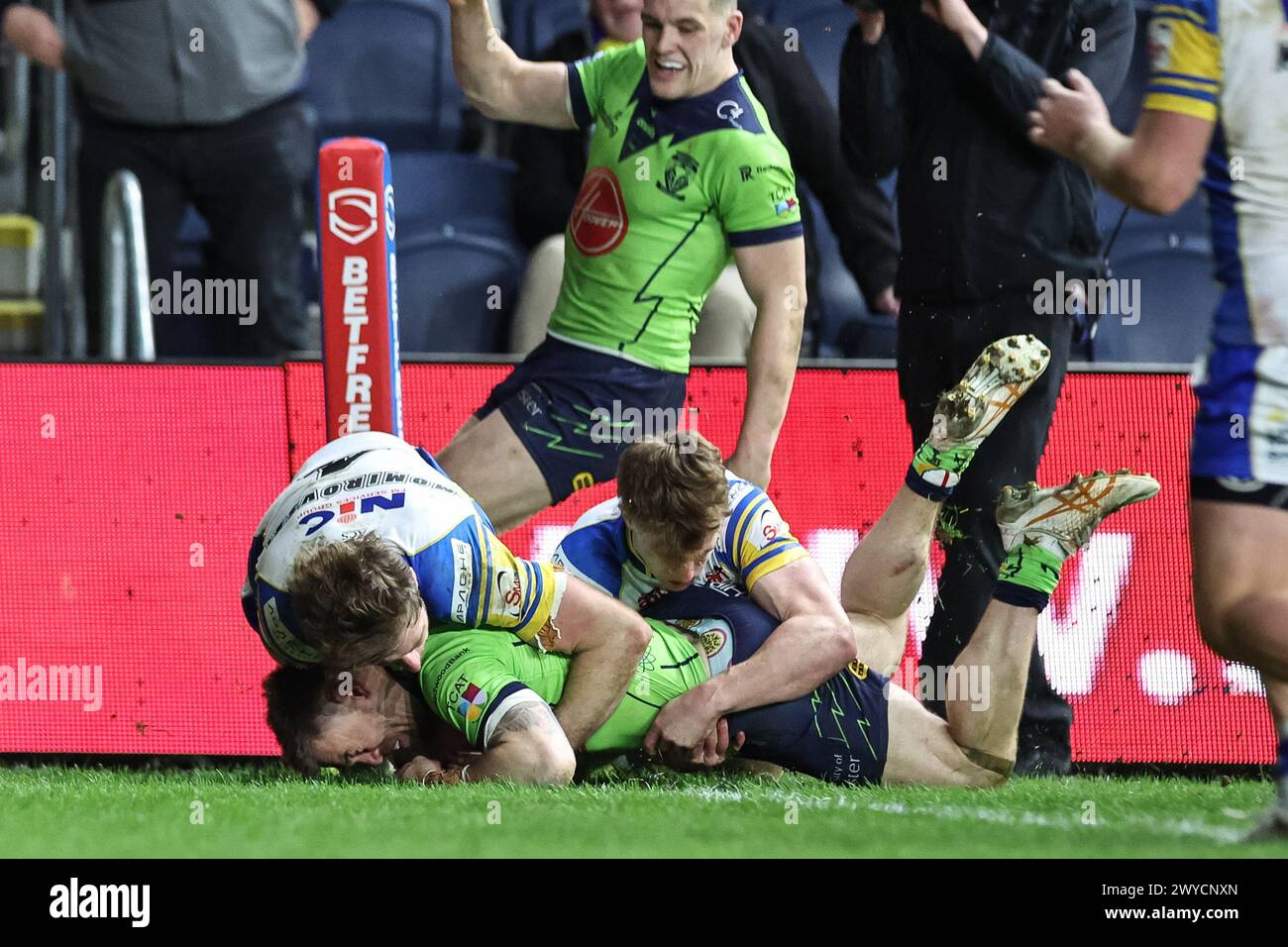 Matt Dufty of Warrington Wolves goes over for a try to make it 8-26 ...