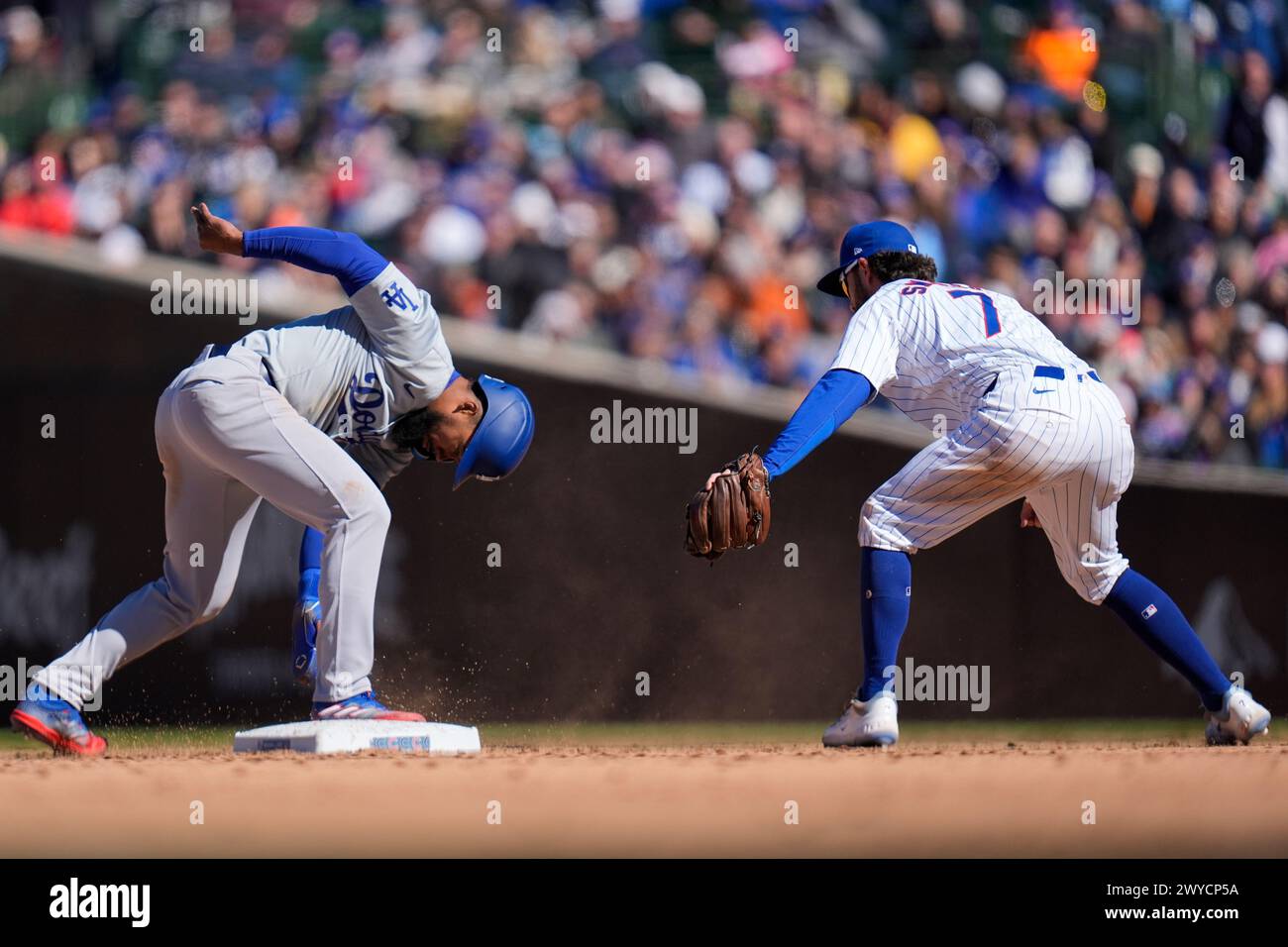 Los Angeles Dodgers' Teoscar Hernández, left, steals second base ...