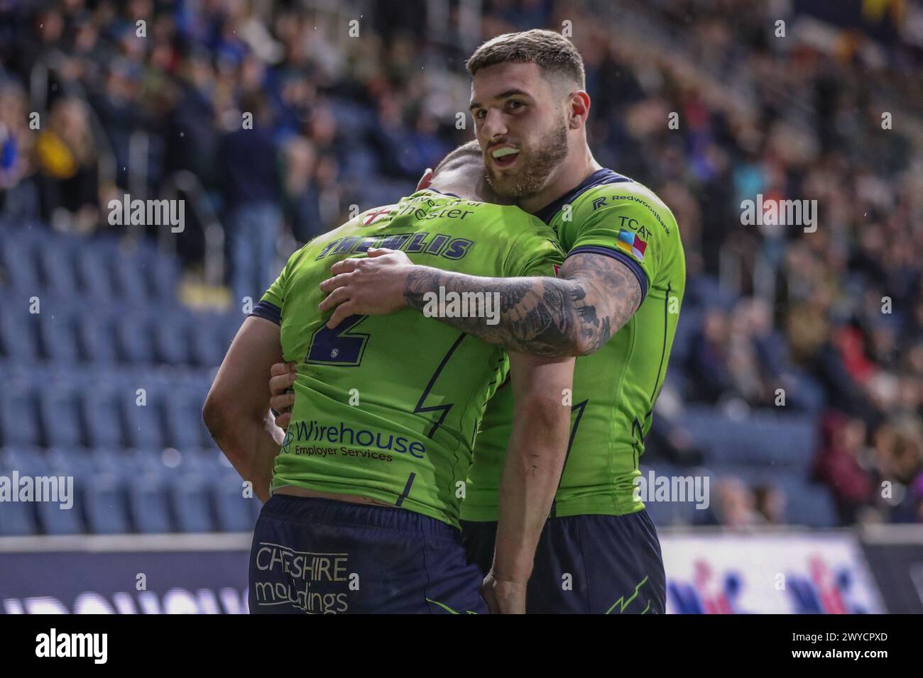 Josh Thewlis of Warrington Wolves celebrates his try during the Betfred ...