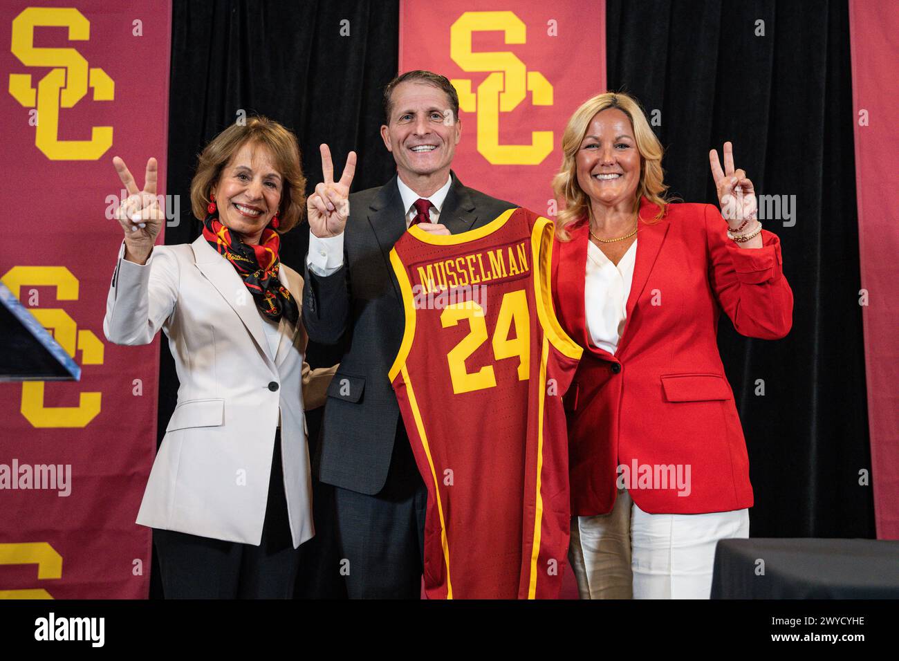 Eric Musselman (center) is introduced as the new head coach for USC ...