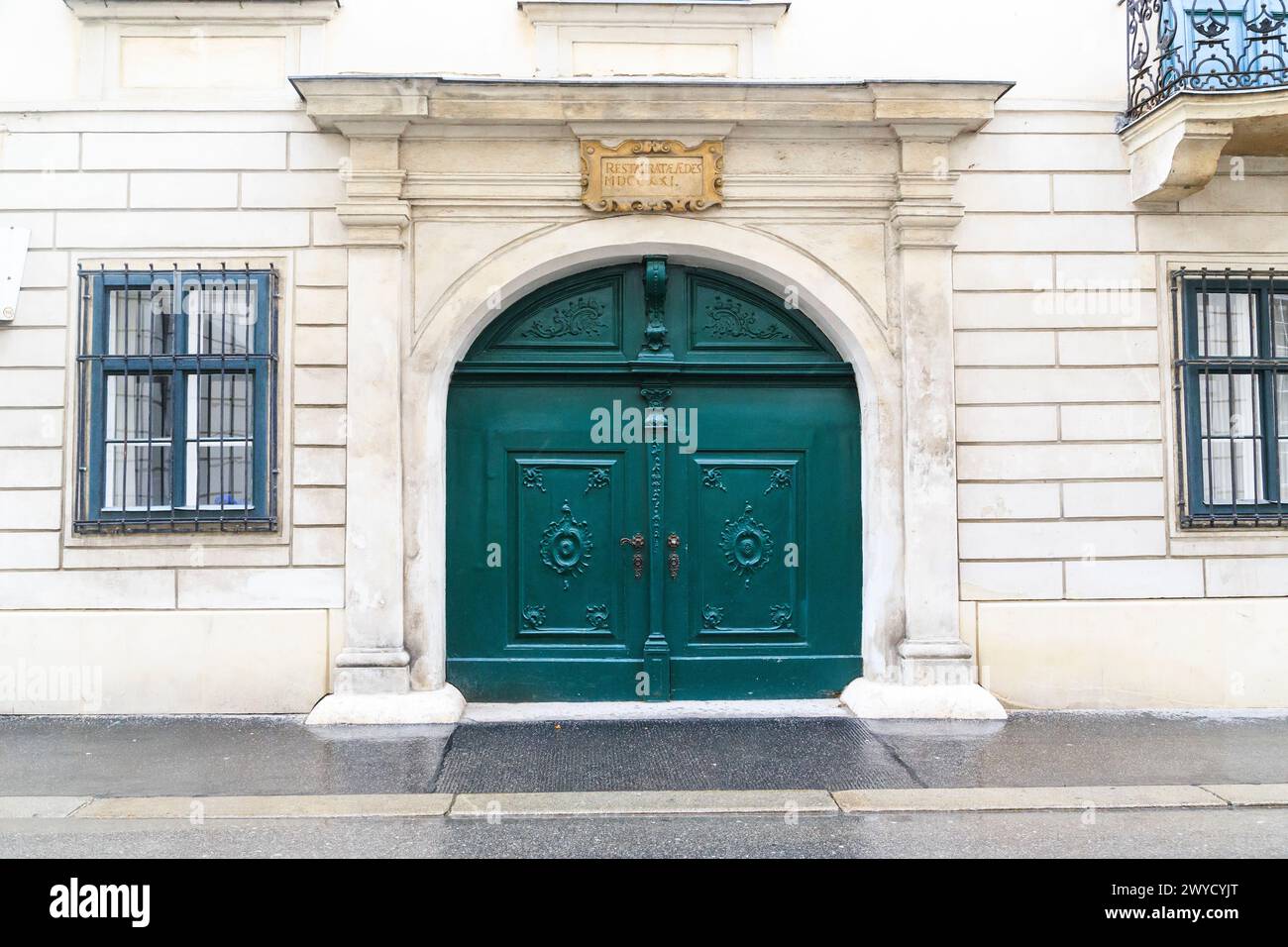 VIENNA, AUSTRIA - MAY 22, 2019: This is a wooden carved gate in an 18th ...