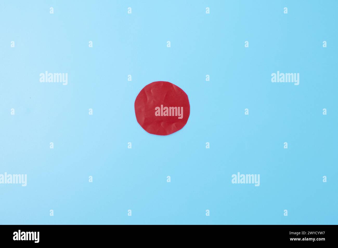 red circle on white paper background, handcrafted, top - view, round ...