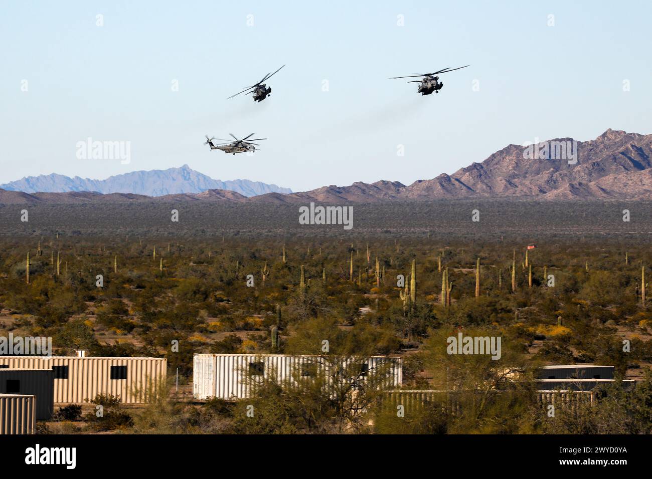 Three U.S. Marine Corps CH-53E Super Stallion helicopters assigned to ...