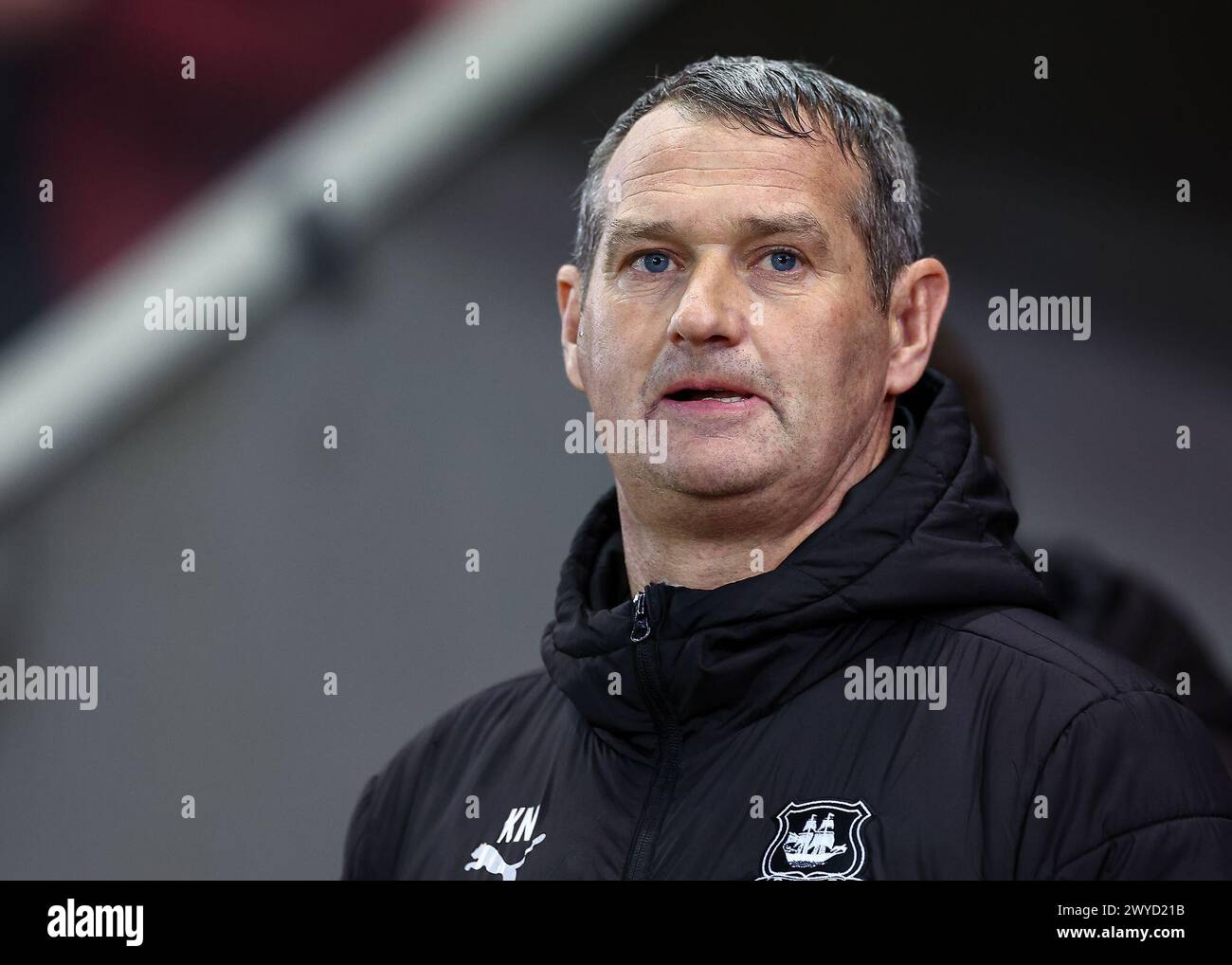 First team coach Kevin Nancekivell of Plymouth Argyle looks on during ...