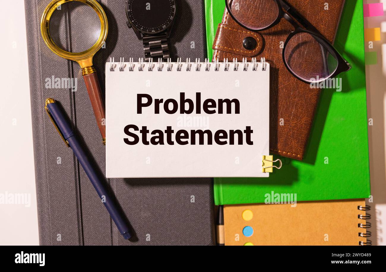 PROBLEM STATEMENT text on notebook with pen on a chart background Stock ...