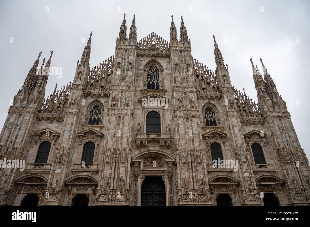 Architectural details of marble Gothic cathedral church in Milan ...