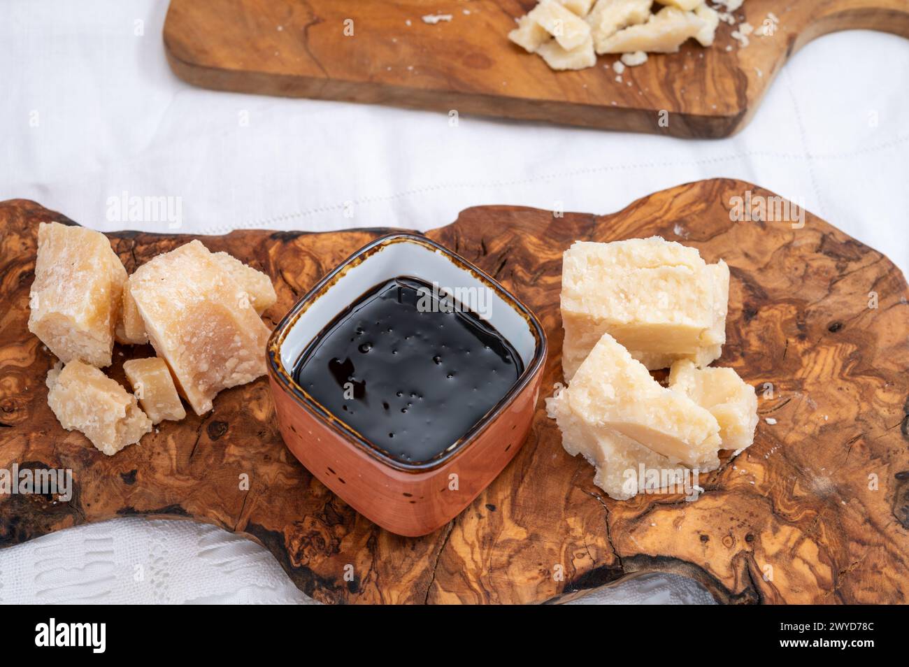 Tasting of 24 and 48 months aged in caves Italian parmesan hard cheese ...