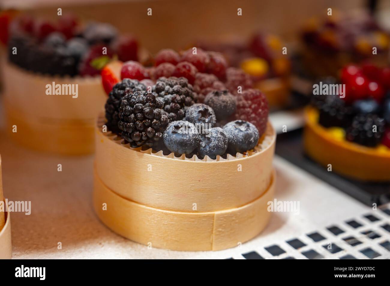Italian sweet dessert dolce pastry and cakes with cream and fruits on ...