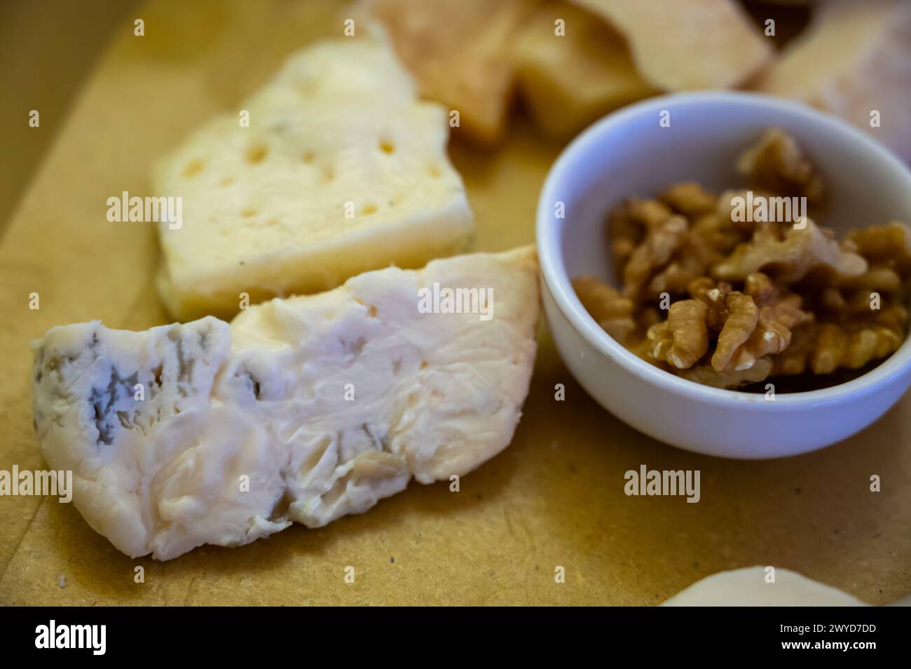 Cheese tasting, piece of italian blue cheeses gorgonzola dolce and ...