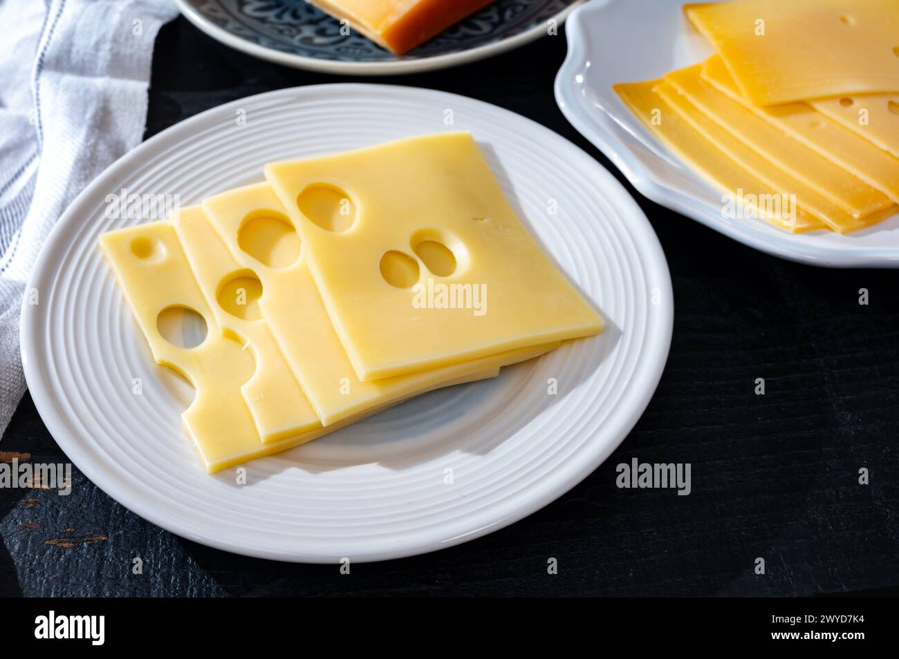 Swiss cheese collection, yellow emmentaler or emmental cheese with ...