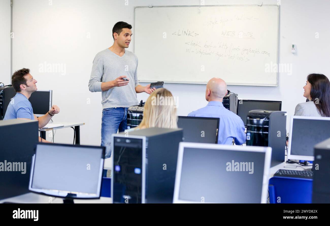 Group of teachers. Computer Academy Stock Photo - Alamy