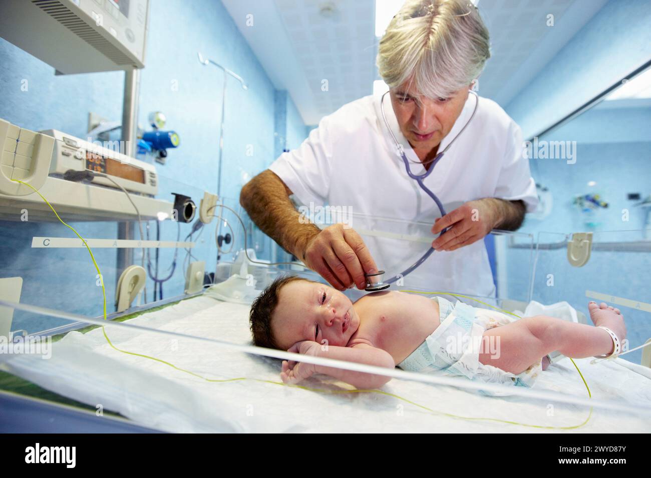 Pediatrician examining newborn baby, pediatrics. Hospital Policlinica ...